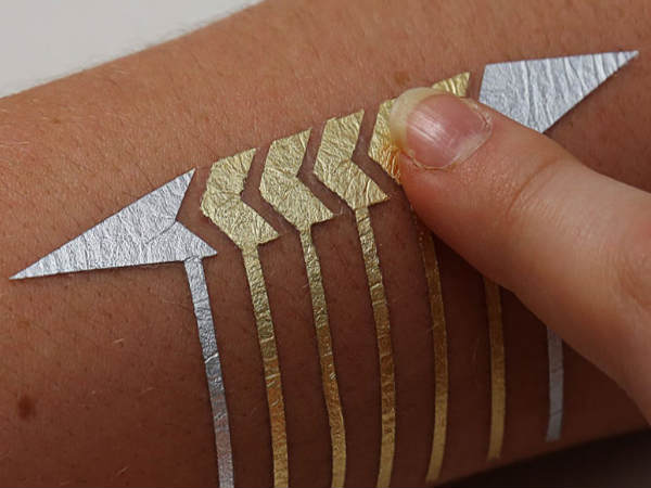 'Smart' tattoo that can remotely control smartphone - Gizbot News
