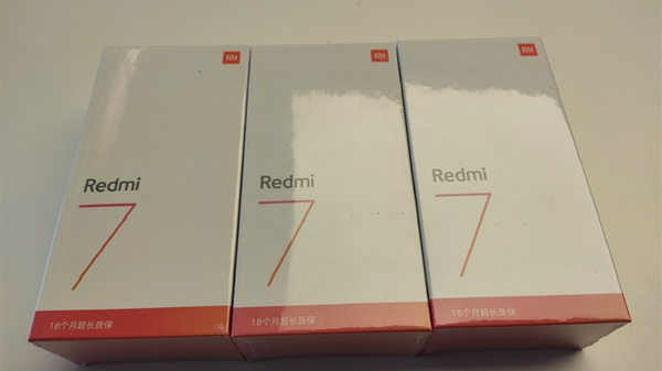 Redmi 7 retail box teased ahead of launch - Gizbot News